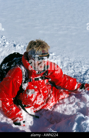 Male skier covered with snow after a snowball fight Stock Photo - Alamy