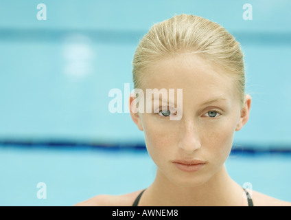 Turquoise indoor swimming pool in glass building Stock Photo - Alamy