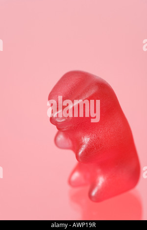 Closeup shot of a sweet red gummy licorice in color background Stock ...