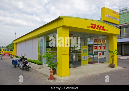 DHL parcels service point in London store Stock Photo - Alamy
