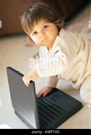 mischievous boy looking down at camera Stock Photo - Alamy