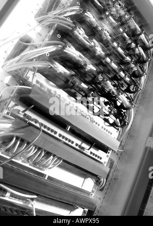 Interior view of a complex electrical panel containing numerous wires ...