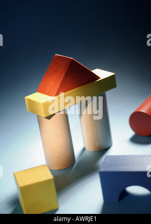 A selective focus of toy building blocks on a wooden surface Stock ...