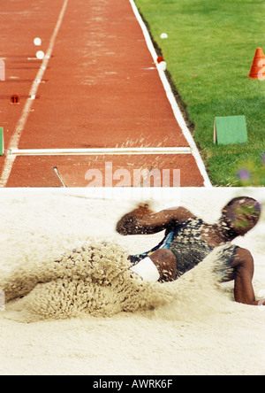 Athlete long jump, sand and sports man training for France olympic ...