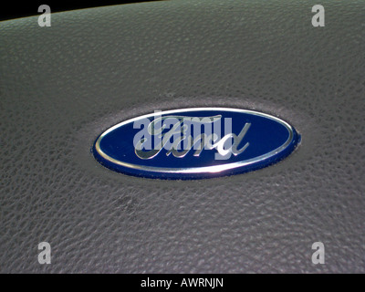 Ford blue oval logo and brand on the windshield of an old F100 V8 ...