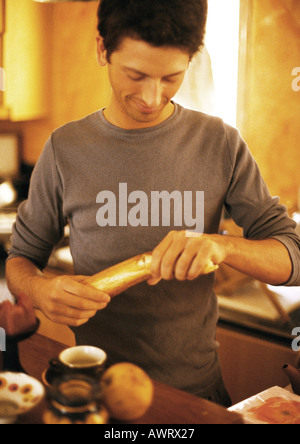 man breaking bread Stock Photo - Alamy