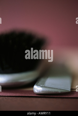 Close-up of hairdressing comb on a black background Stock Photo - Alamy
