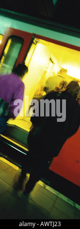 Image of travelers in a D-train Stock Photo - Alamy