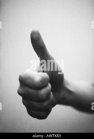 Sign language, hand and thumb pointing in a studio for direction ...