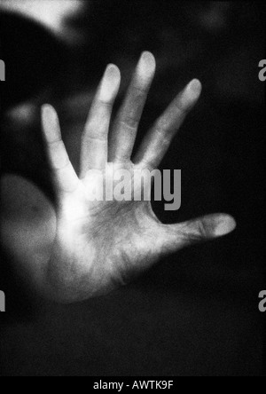 Close-up Of Person Pressing Palm With Thumb On White Background Stock ...