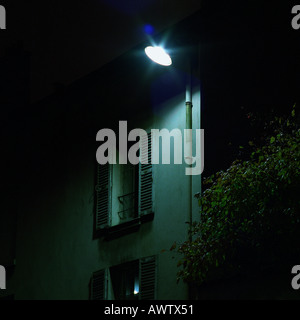 one security light on building site at night Stock Photo - Alamy