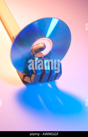 Toy Robot Hand Holding CD Stock Photo - Alamy