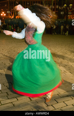 Woman in Basque traditional folk costume dances in Arenal, Bilbao ...