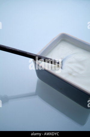 Yogurt in square pot Stock Photo - Alamy