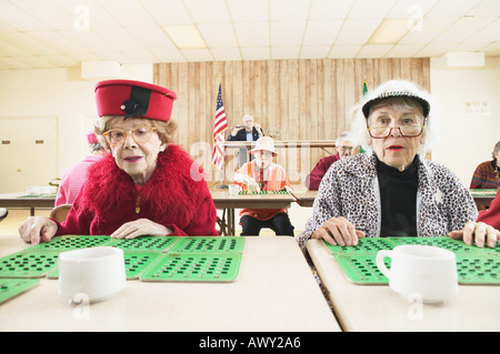 Pair of women playing bingo Stock Photo - Alamy