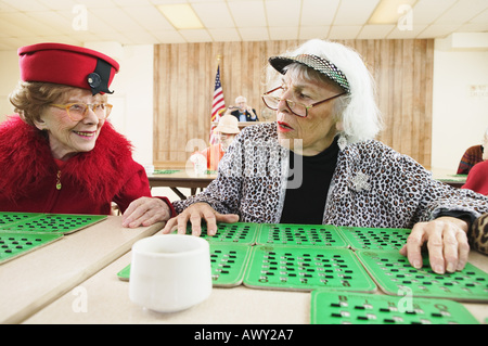Pair of women playing bingo Stock Photo - Alamy