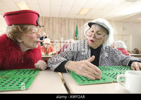 Pair of women playing bingo Stock Photo - Alamy
