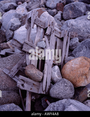Driftwood on pebble beach on Norwegian coast at Kirkenes Stock Photo ...