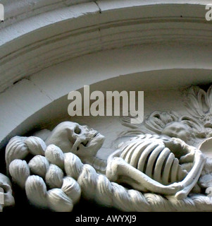 reclining skeleton carving Stock Photo - Alamy