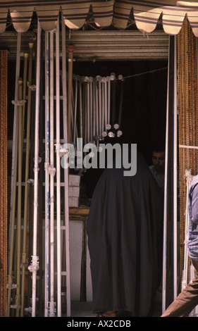 Iraqi women in black chador robe on Baghdad Iraq street Stock Photo - Alamy