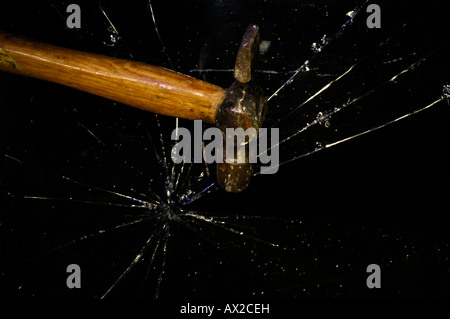 hammer breaking glass Stock Photo: 124000357 - Alamy