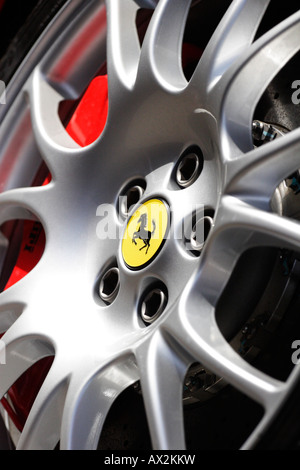 Close up of Ferrari alloy wheel with logo Stock Photo - Alamy