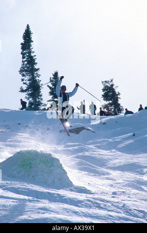 Jumping skier at jump Stock Photo - Alamy