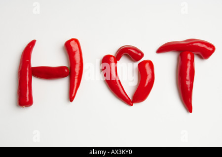 Red chili peppers spell out words relating to their taste Stock Photo ...