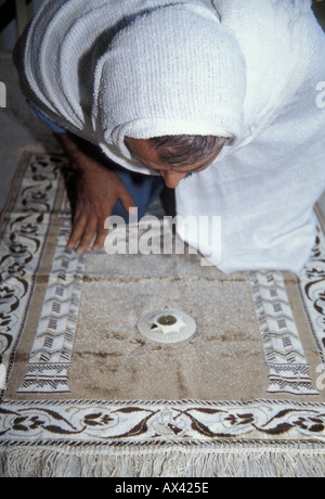 muslim prayer mat with compass Stock Photo - Alamy