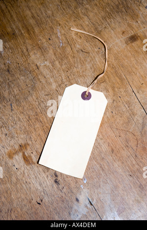 Blank Paper Label On A Wooden Background Stock Photo - Alamy