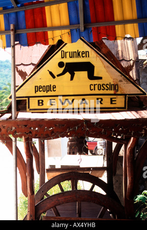 Drunken people crossing warning sign showing a drunk man crawling in ...