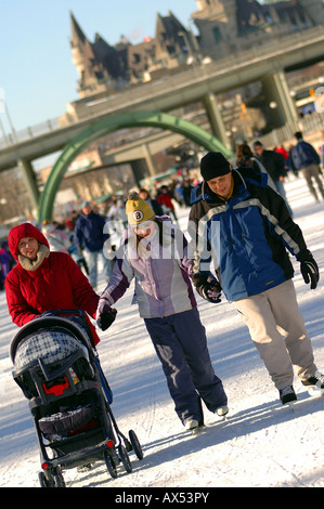Skaters skate along the Rideau Canal Skateway during the first official ...