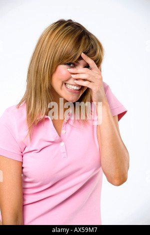young woman feeling embarrassed with hand on forehead also known as ...