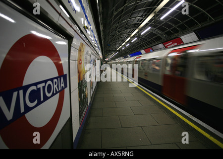 Interior view of a platform and the logo of Victoria Station Stock ...
