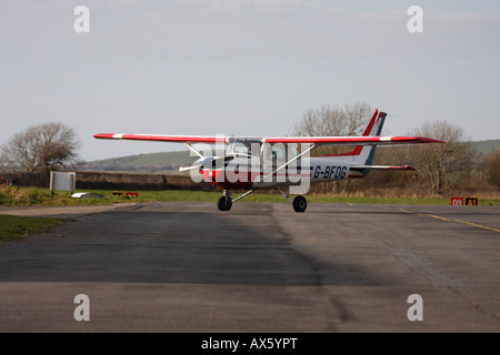 Small Airplane Cesna on airfield, taxi, taxiing, on runway withybush ...