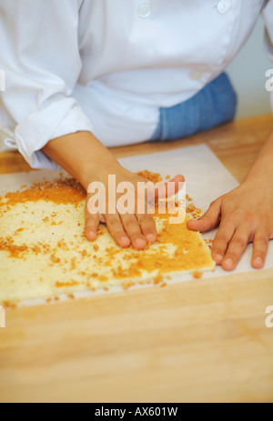 Pastry chef making swiss roll Stock Photo - Alamy