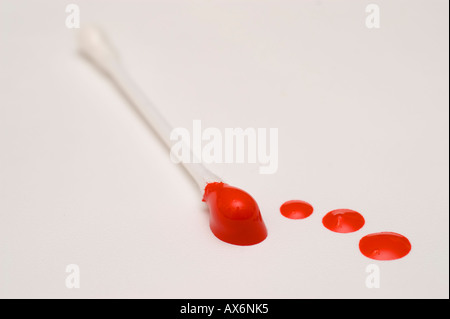 colourful Q tips dipped in red blue green and yellow paint Stock Photo ...