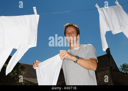 Hanging out the washing Stock Photo - Alamy