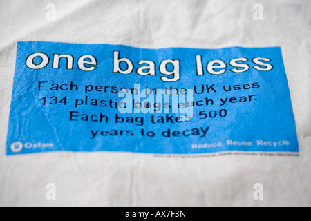 Oxfam "One Bag Less" slogan on a reusable shopping bag, UK Stock Photo ...