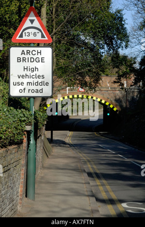Road sign warning of a low railway bridge Stock Photo - Alamy