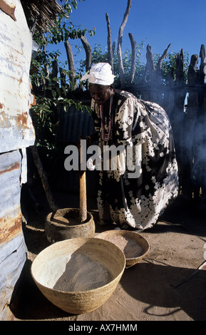 Owambo woman preparing traditional oshifima porridge Namibia Stock ...