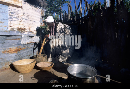 Owambo woman preparing traditional oshifima porridge Namibia Stock ...