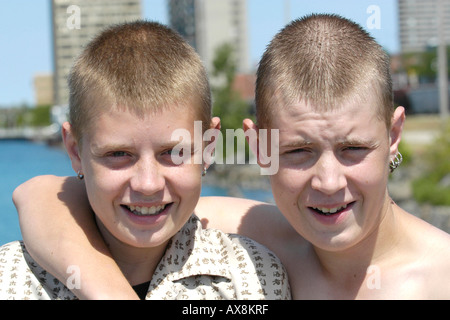 twin brothers men look alike use vintage photo camera, photographing ...