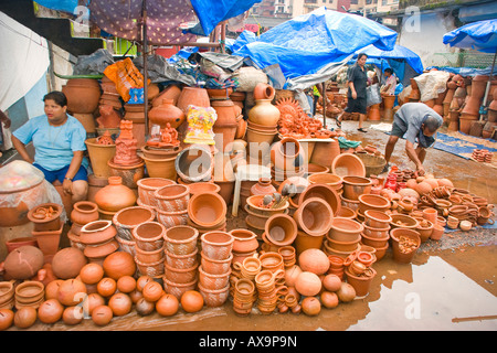 India Goa Mapusa market crafts pottery market women sheltering from ...