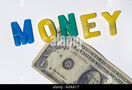 fridge magnets with a dollar bill Stock Photo - Alamy