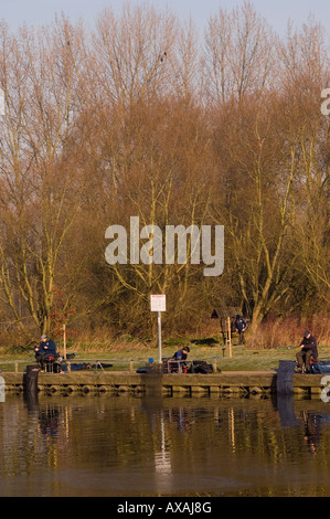 Fishing Match At Beccles Quay In Winter in the uk Stock Photo - Alamy