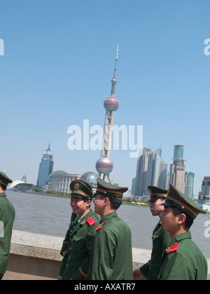 People in military uniforms walk along Red Square in Moscow. Victory ...
