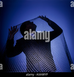 Trapped in the net, internet anxiety Stock Photo - Alamy