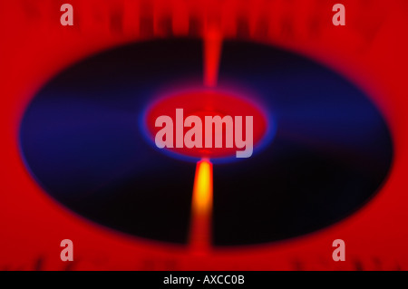 information concept computer disc bathed in red and blue light high ...