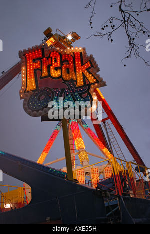 Freak Out fairground ride sign against A frames and blue sky, Tavistock ...